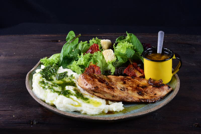 Dish with Mashed Potato Fish Fillet and Fried Tilapia Salad Stock Photo ...