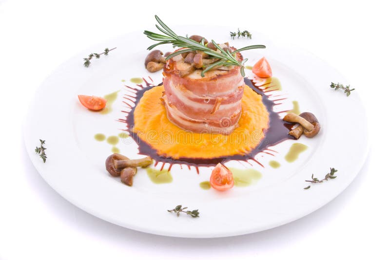 Dish with Meat of the Rabbit Wrapped Up by Bacon Stock Image - Image of ...