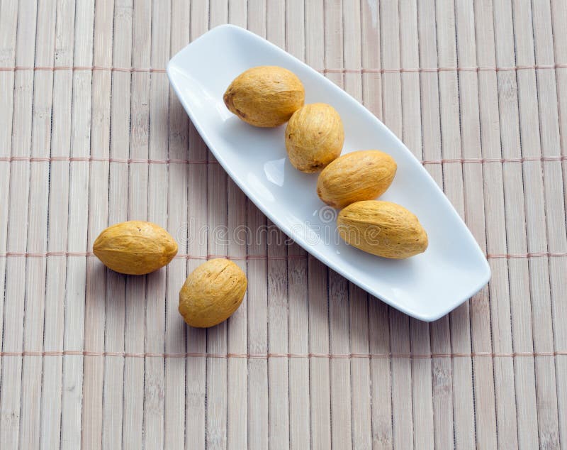 Dish of Nuts on a Bamboo Napkin Stock Image - Image of nutty, object ...
