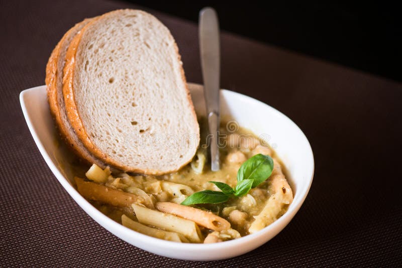 Dish of pasta with bread stock photo. Image of background - 32051560