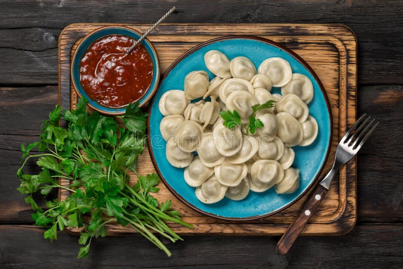 Dish with Ravioli and Red Sauce, Top View Stock Image - Image of filled ...