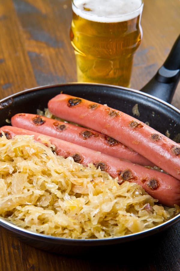 Dish with Roasted Wurstel and Sauerkraft Stock Image - Image of ...