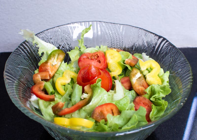 Dish of salad on the table stock image. Image of gourmet - 164135963