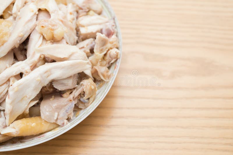 Dish of Shredded Boiled Chicken on Wood Table Stock Image - Image of ...