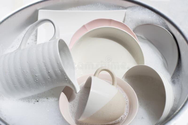 Dish Washing, Utensils Soaking in Kitchen Sink Stock Image - Image of ...
