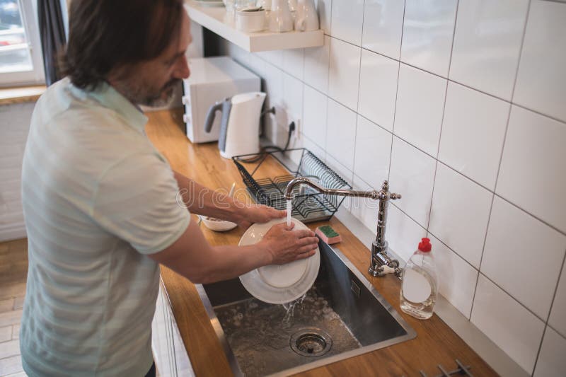 Man Washing Dishes in the Kitchen Stock Image - Image of wash, home ...
