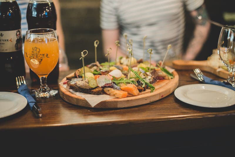 Dishes with Different Snacks on Bar Counter Editorial Photo - Image of ...