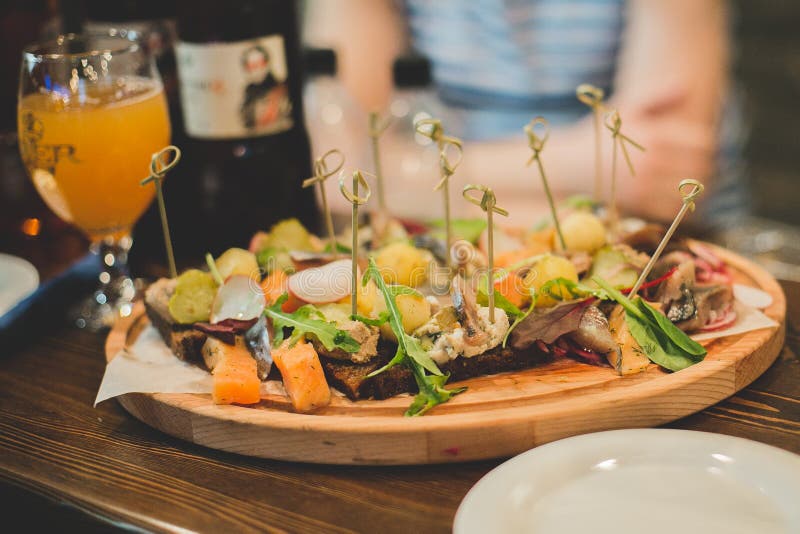 Dishes with Different Snacks on Bar Counter Editorial Image - Image of ...