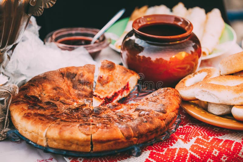 Dishes of the Traditional Belarusian Cuisine - Pie and Honey. Stock ...