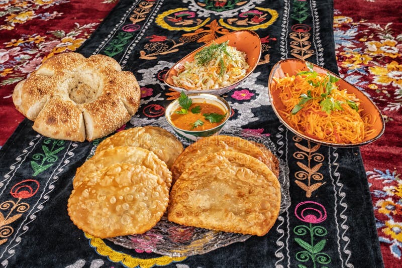 Dishes of Traditional Uzbek Oriental Cuisine on the Table Stock Photo ...