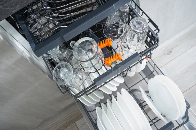 Dishwasher Machine, Open and Loaded with Dishes in the Kitchen, after ...