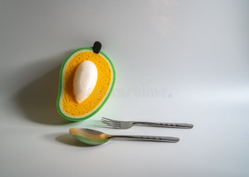 A Dishwashing Sponge, Shaped Like a Cute Mango Stock Image - Image of ...