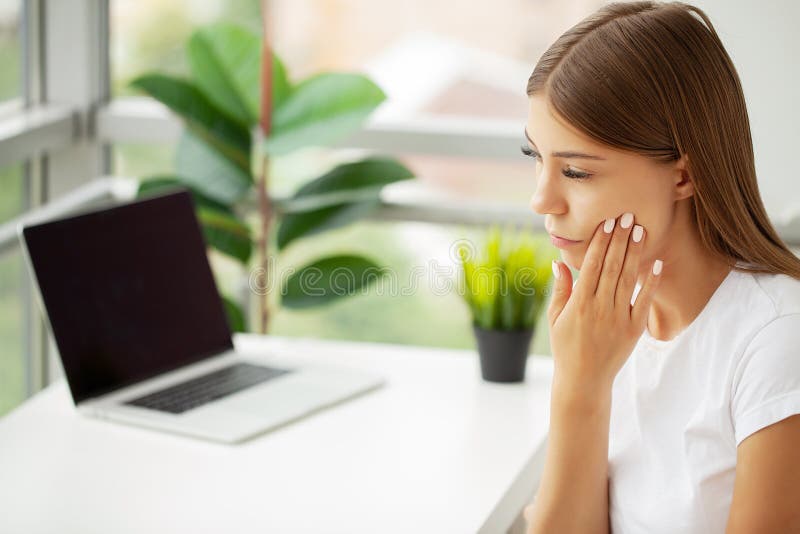 Disillusioned Lady Feeling Pain in Tooth while Working in Office. Stock ...