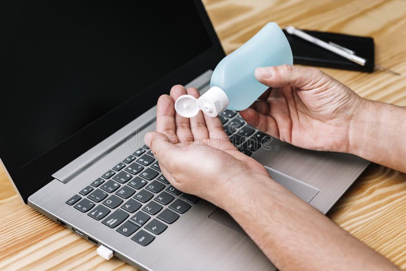 Disinfecting Hands before Use Computer Stock Photo - Image of bacterial ...