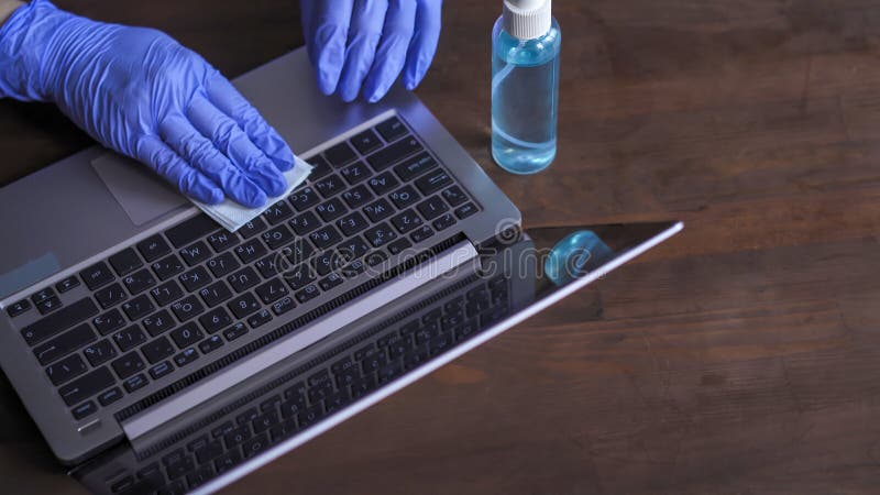 Disinfection of a Computer Keyboard. Hands in Gloves Carry Out ...