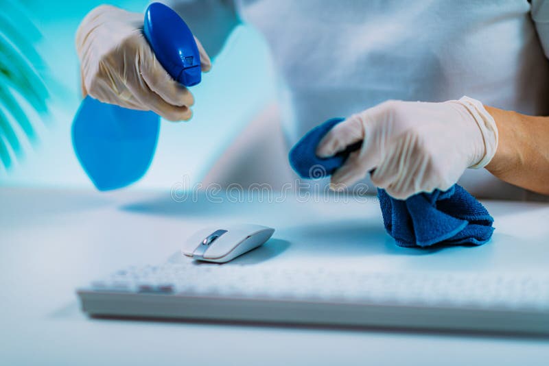 Disinfection of Computer Keyboard and Mouse. Woman Disinfecting ...