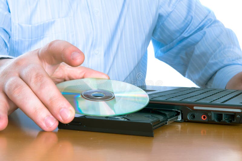 Disk drive of a computer stock image. Image of fingers - 4548073