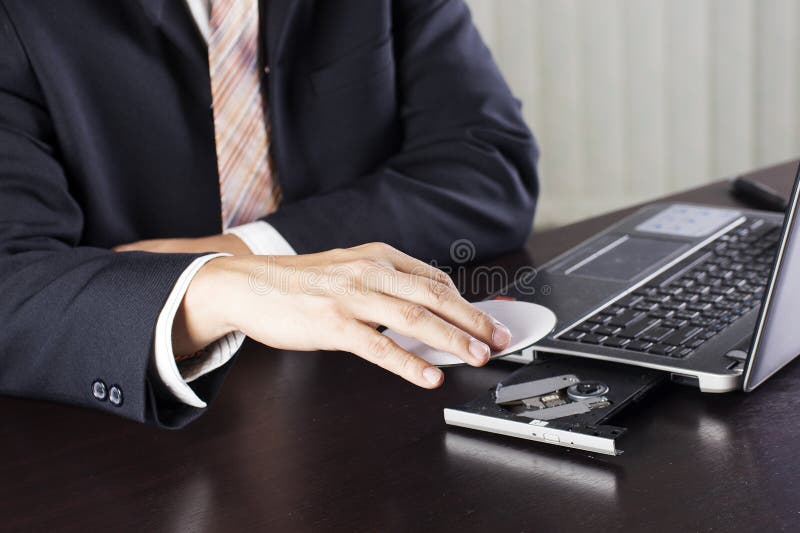 Disk Insert To Laptop Computer Stock Image - Image of information ...