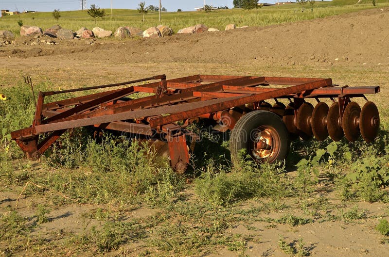 Disk parked in the weeds stock image. Image of disk, weeds - 61361977