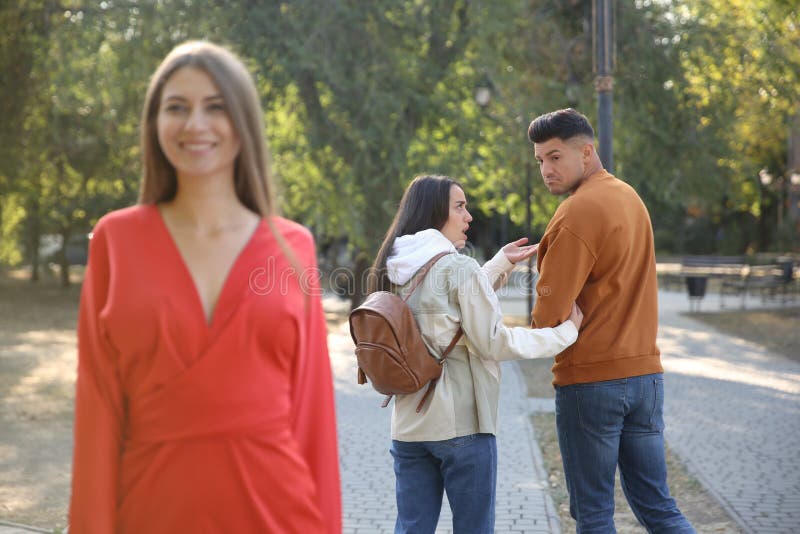 Disloyal Woman Looking Another Man and Her Angry Boyfriend Stock Image ...