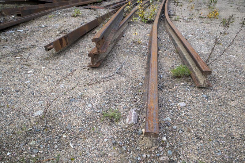 Dismantled Railroad Rails on Ground Outdoors Stock Photo - Image of ...