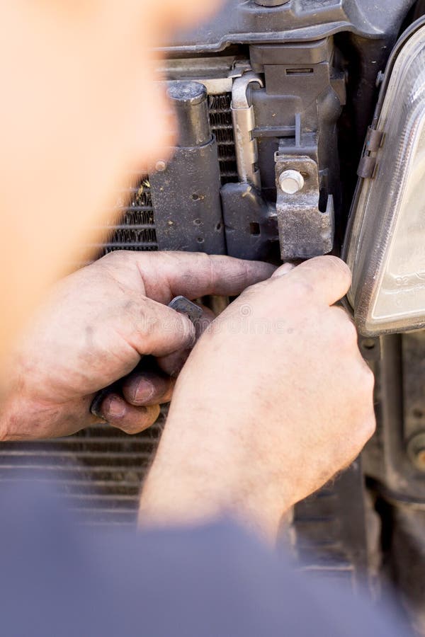 Dismantling Broken Car Radiator at Car Service Stock Photo - Image of ...