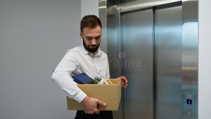 Dismissed Worker with Dismissal Box Entering into the Modern Elevator ...