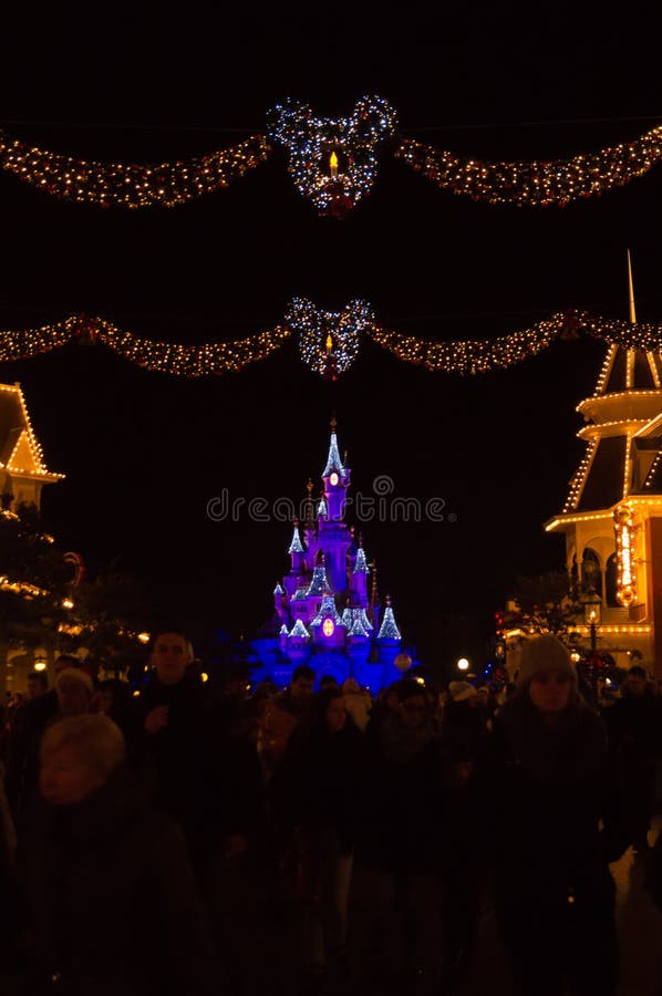 Disney castle at night editorial photo. Image of street - 63512516