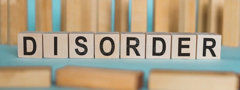 DISORDER Word Written on Wooden Blocks on Light Blue Background Stock ...
