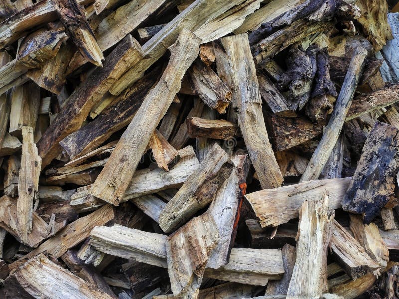 A Disordered Stack of Split Firewood Pieces, Displaying Varied Textures ...