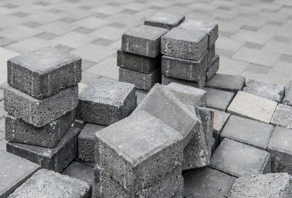 Gray Square Pavement Bricks in a Stockpile Stock Photo - Image of ...