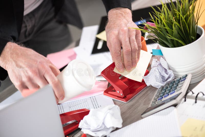Disorganized Businessman Looking for Documents Stock Photo - Image of ...