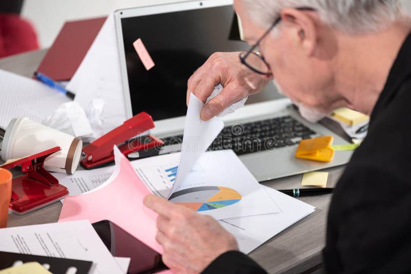 Disorganized Businessman Looking for Documents, Light Effect Stock ...