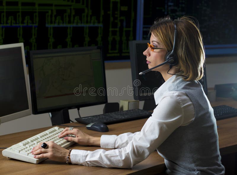 Operator with Headphone in Power Distribution Control Center Stock ...