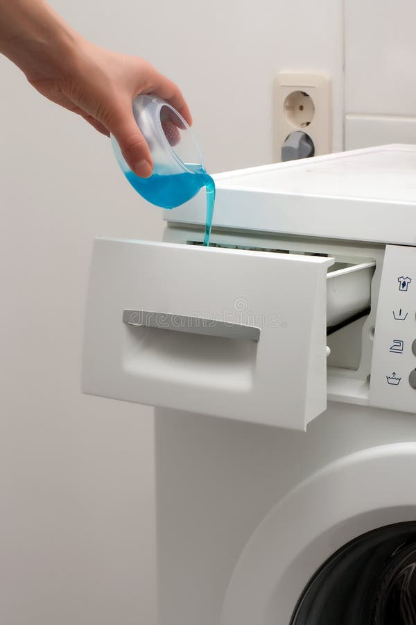 Adding Detergent To Dispenser Stock Photo - Image of machine, fluid ...