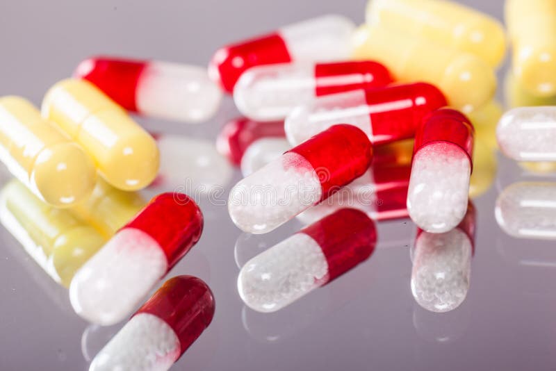 Dispersione Le Capsule E Delle Compresse Immagine Stock - Immagine di ...