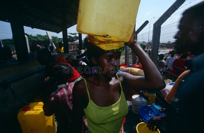 Boy Collecting Water editorial image. Image of relief - 7533825