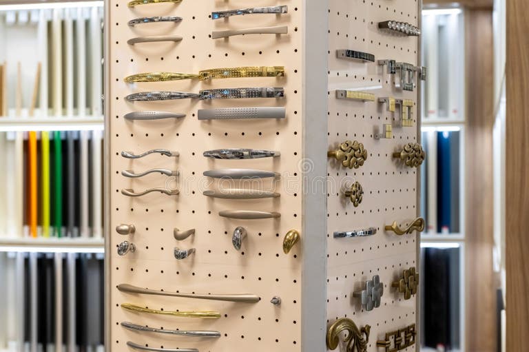 Display of Assorted Cabinet Handles and Knobs on Pegboard. Interior ...