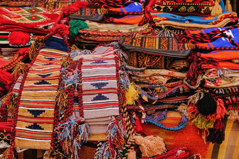 Display with Assortment of Bright Red Orient Rugs with Traditional ...