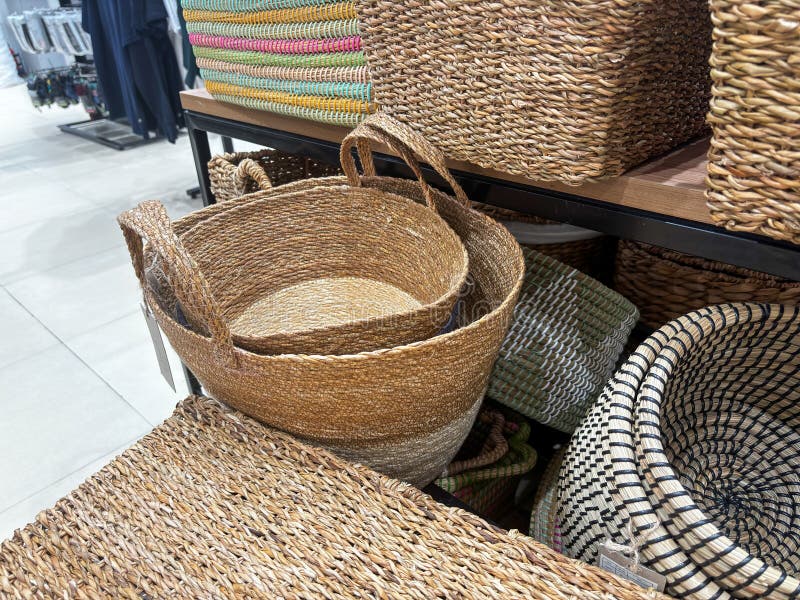 A Display of Baskets and Baskets of Different Sizes and Colors Stock ...