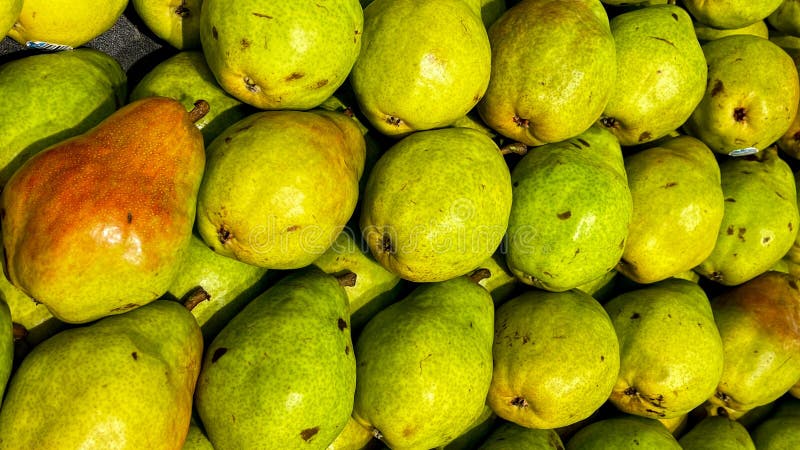A Display of Bright Green Pears Stock Photo - Image of business, bazaar ...