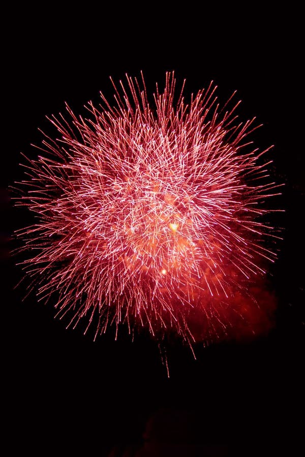 Display of Bright Red Fireworks Against the Black Sky Background Stock ...