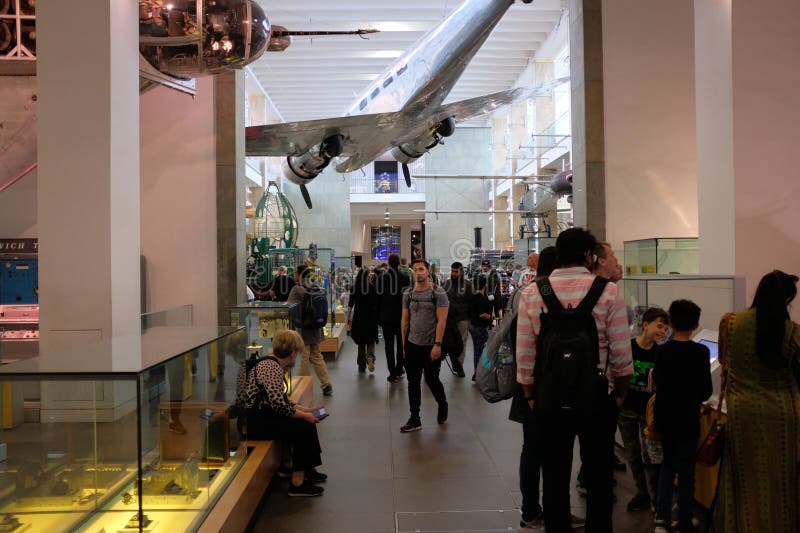 Museum Interior with a Suspended Silver Airplane Model Overhead ...
