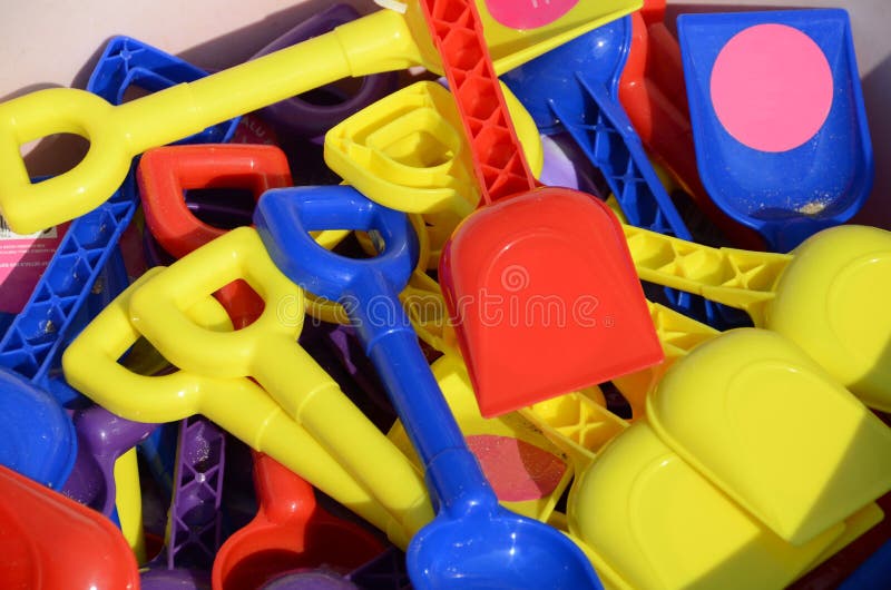 Childrens Spades on a British Beach Stock Photo - Image of beach, tools ...