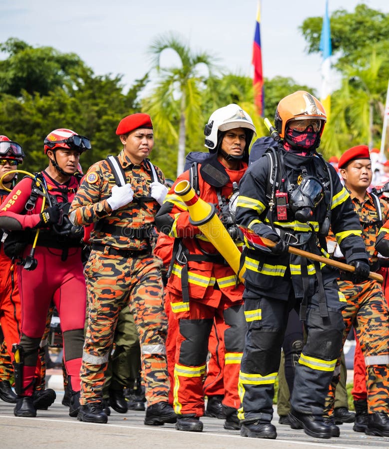 Brave in Formation: Firefighters March Proudly with Their Equipment ...