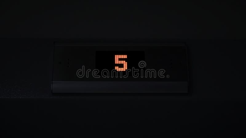 Display of an Elevator Going Down Indicating the Floor Number Passing ...