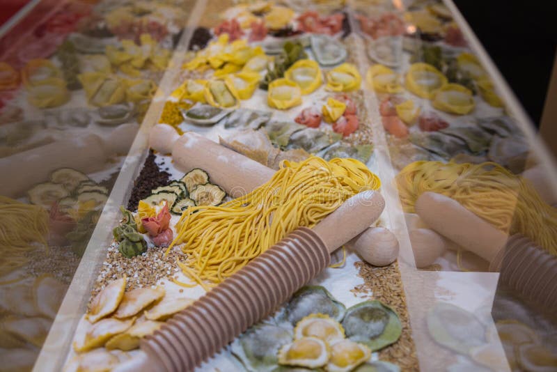 Display of a Food Store with Various Rows of Raw Coloured Pasta Stock ...