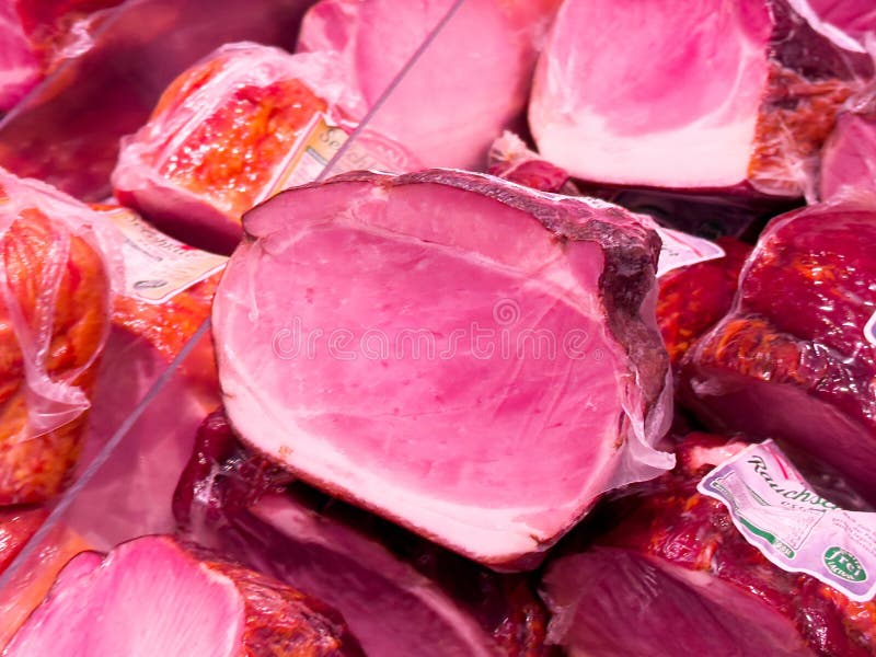 Display of Freshly Cut Pink Ham in Transparent Packaging at Market ...