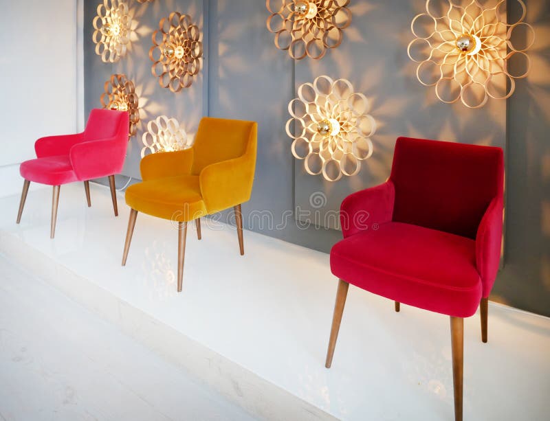 Display of Modern Chairs in Wood and Fabric Stock Photo - Image of ...