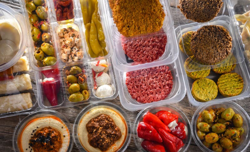 A Display of Prepackaged Food Products in Plastic Boxes Stock Photo ...